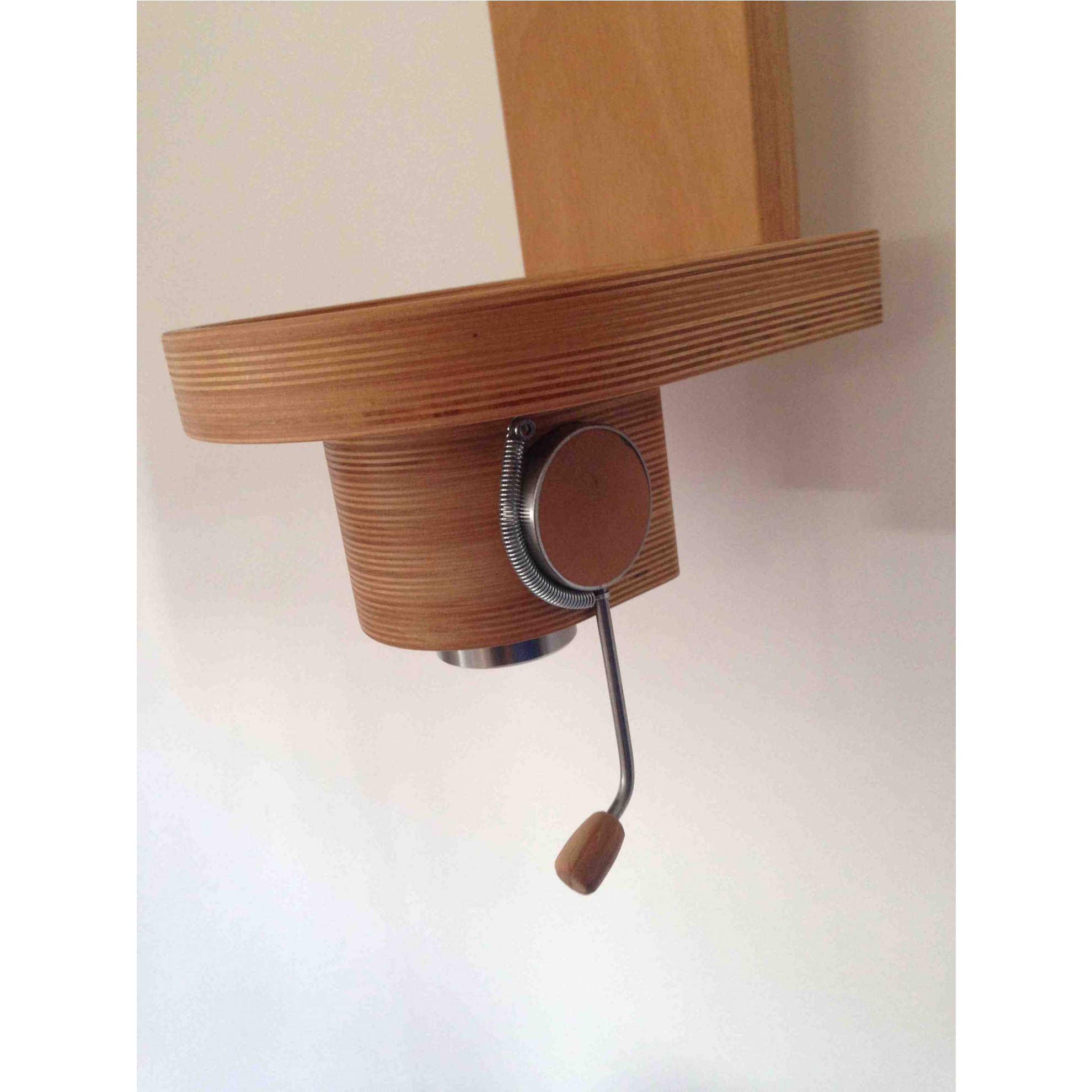 Locking system with lever spring and outlet nozzle